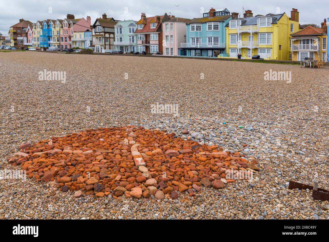 Angel of the East on the beach with seafront houses in the distance at ...