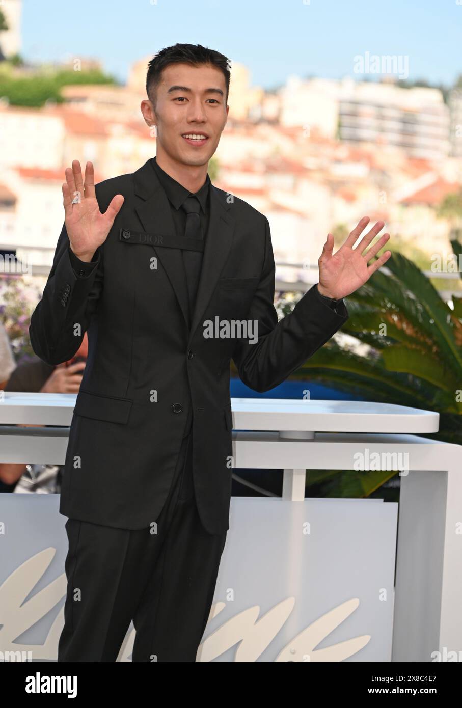 Zhou You (in Dior) Photocall of the film "Feng liu yi dai" ("Caught by ...