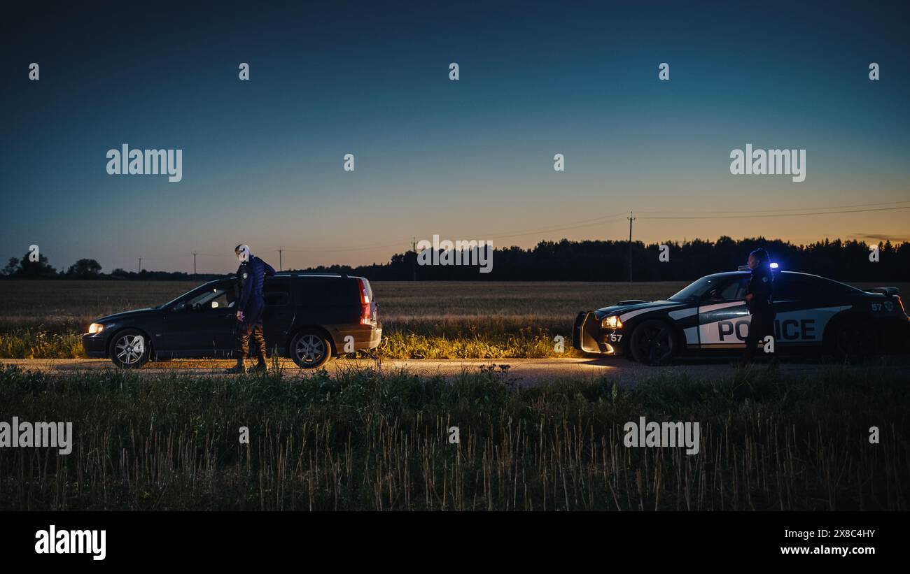 Policeman arresting woman hi-res stock photography and images - Alamy