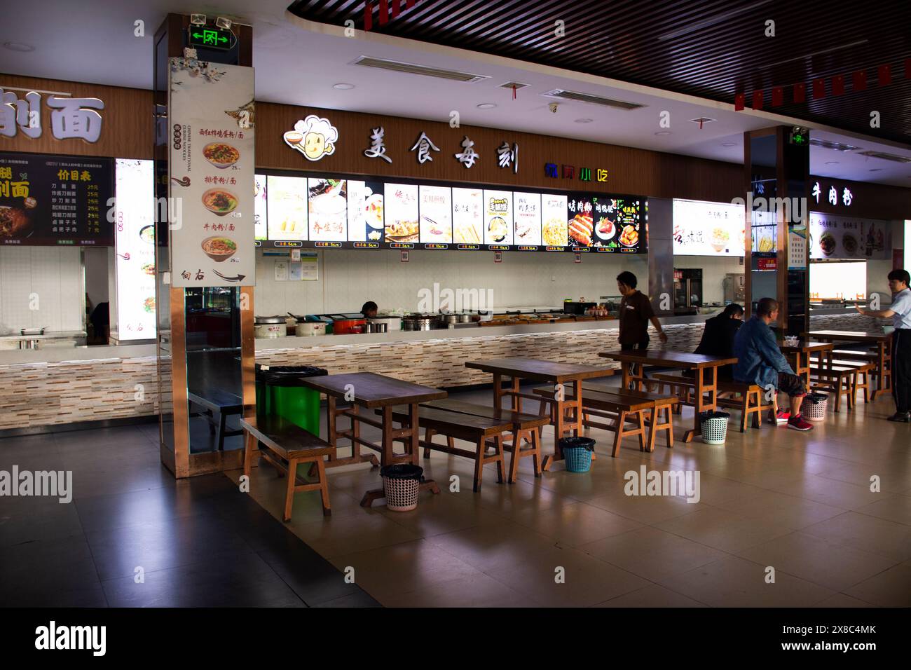 Chinese people and foreign travelers driving stop vehicle rest relax ...