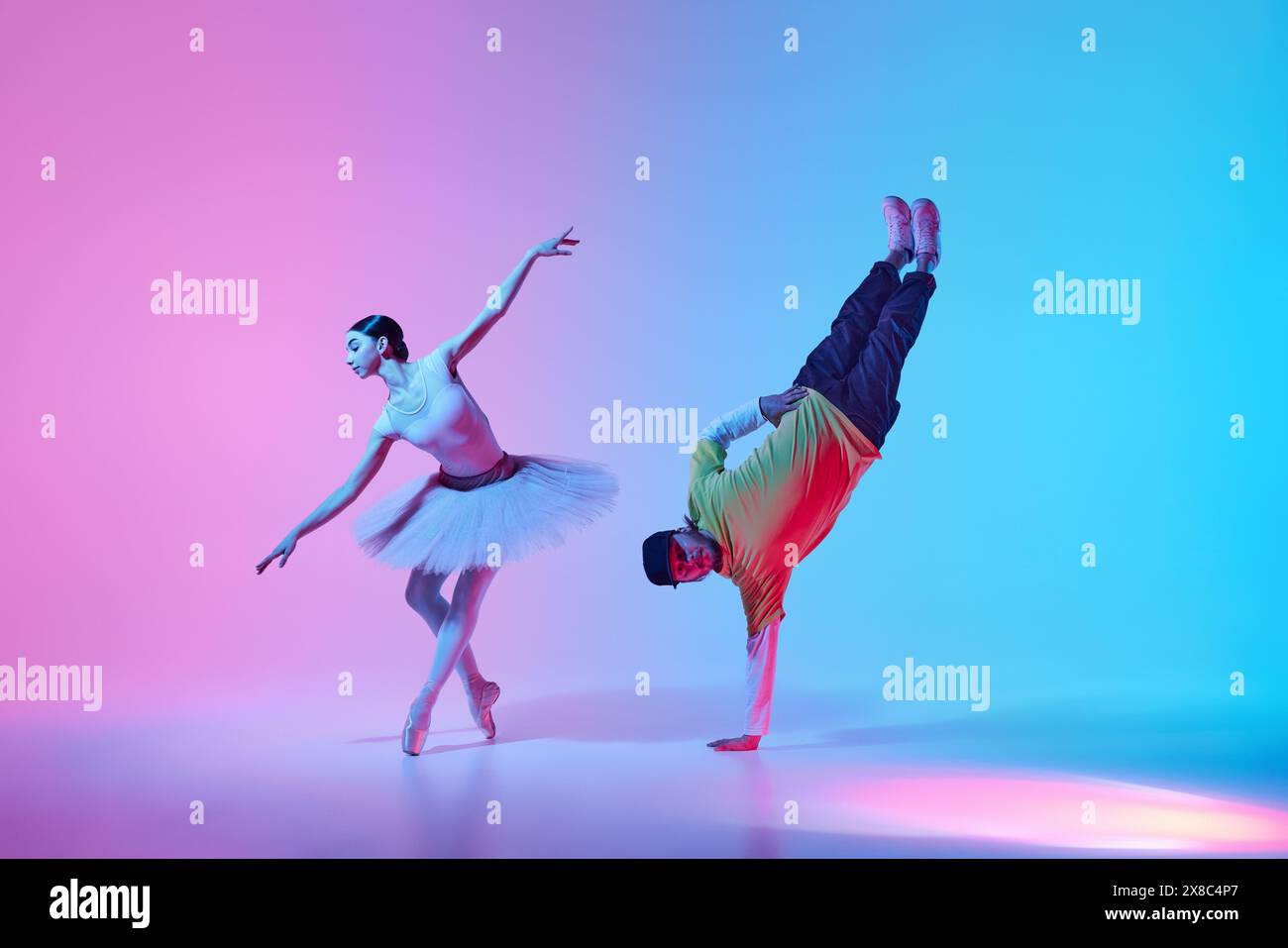 Ballet Meets Street Dance. Ballerina in traditional white tutu and ...