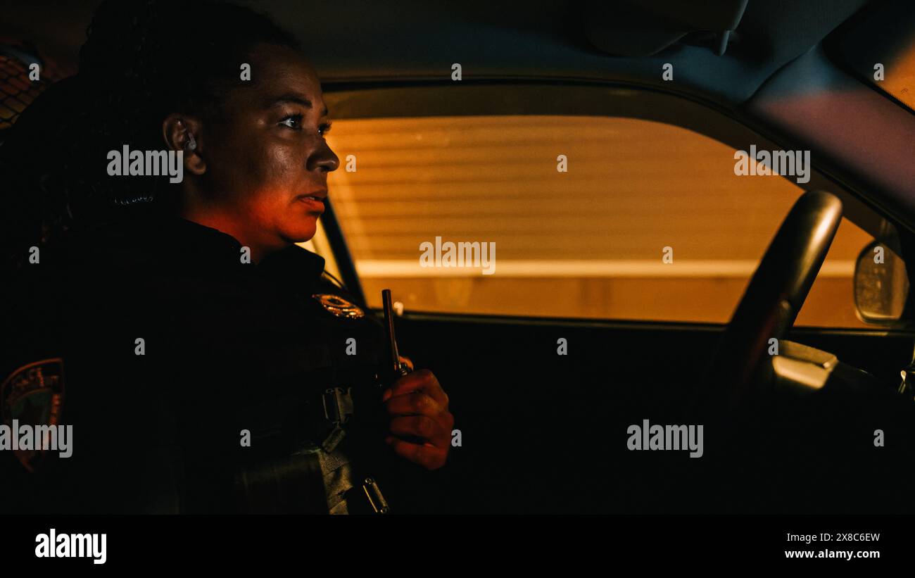 Inside Police Traffic Patrol Squad Car: Black Female Police Officer on ...