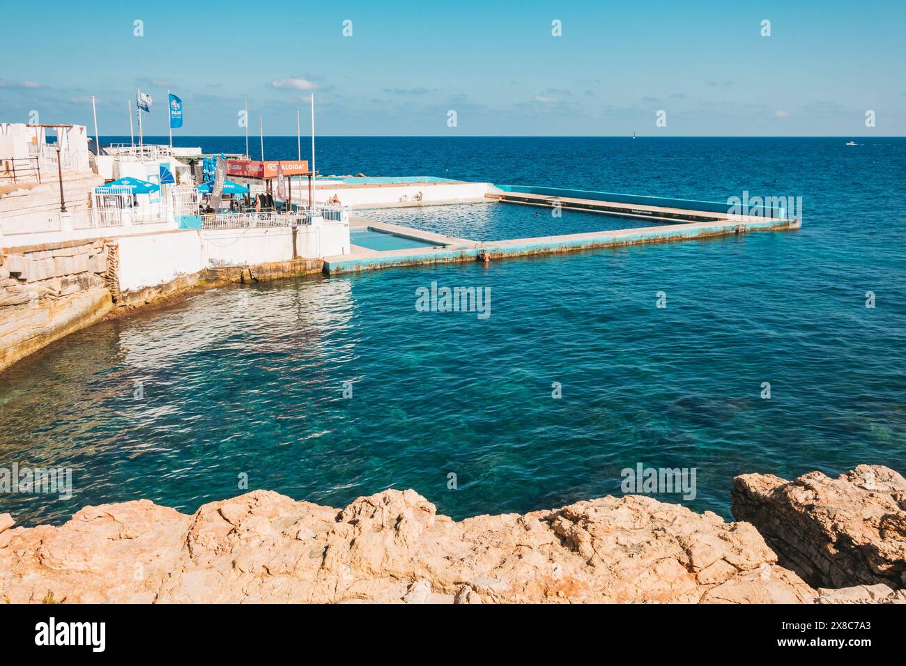 a concrete pool in the sea at the Sliema Aquatic Sports Club in ...