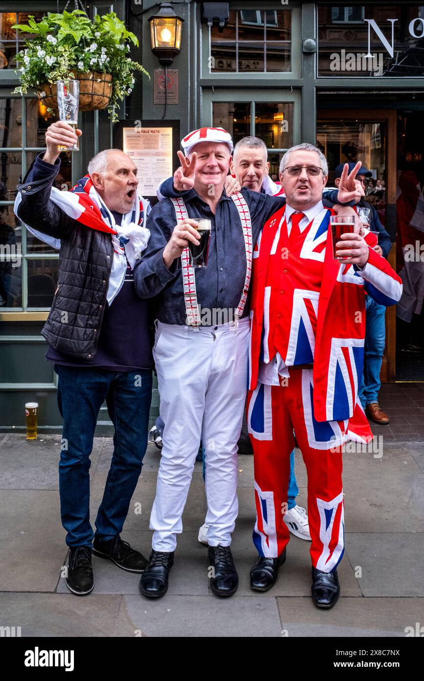 A Group of Men Outside A Pub Celebrating St George's Day In Central ...