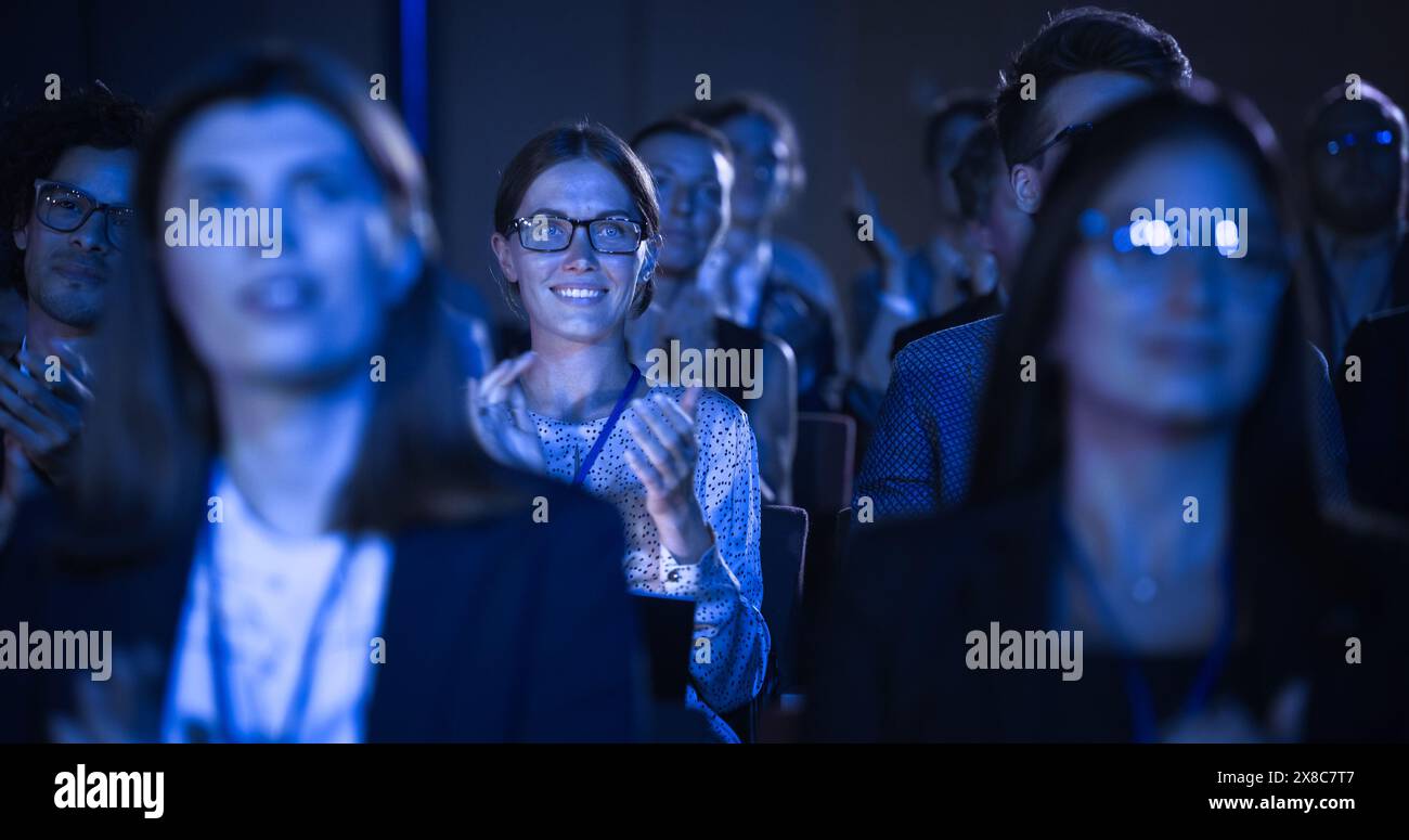 Female sitting crowded tech conference hi-res stock photography and ...