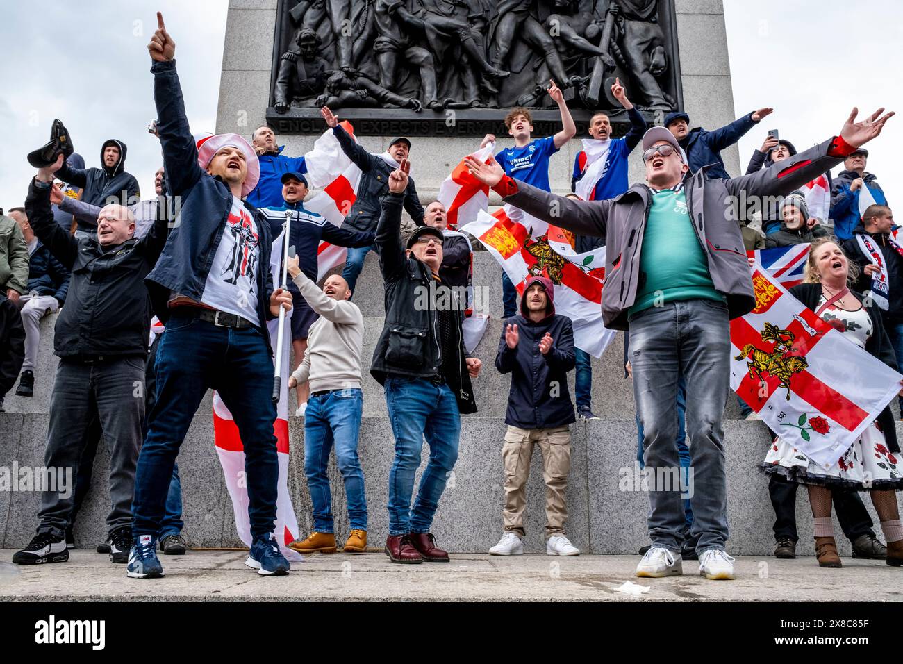 A Group of English People Singing In Trafalgar Square During St George ...