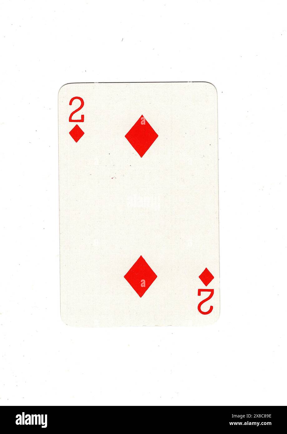 A vintage two of diamonds playing card isolated on a white background ...