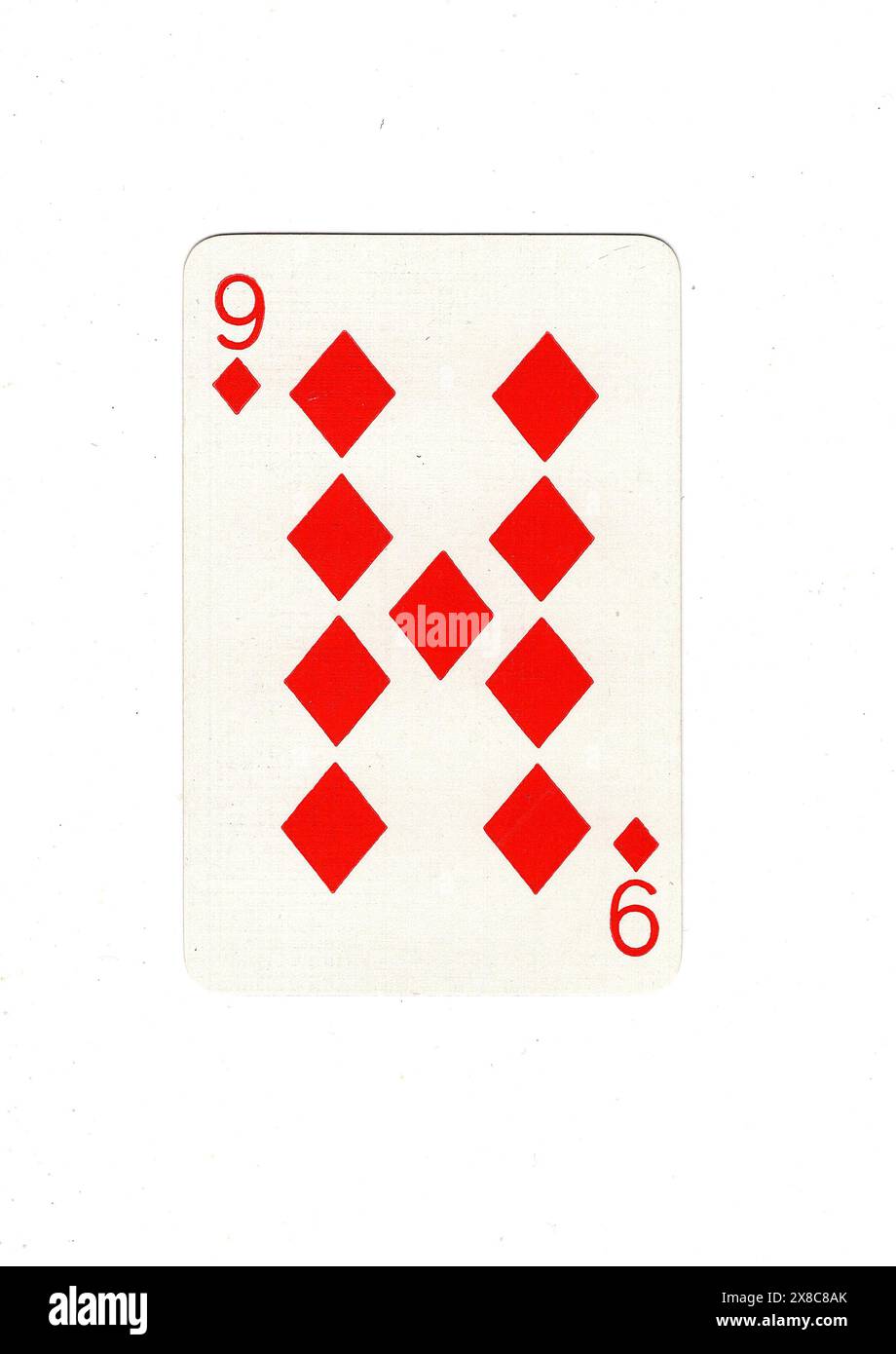 A vintage nine of diamonds playing card isolated on a white background ...