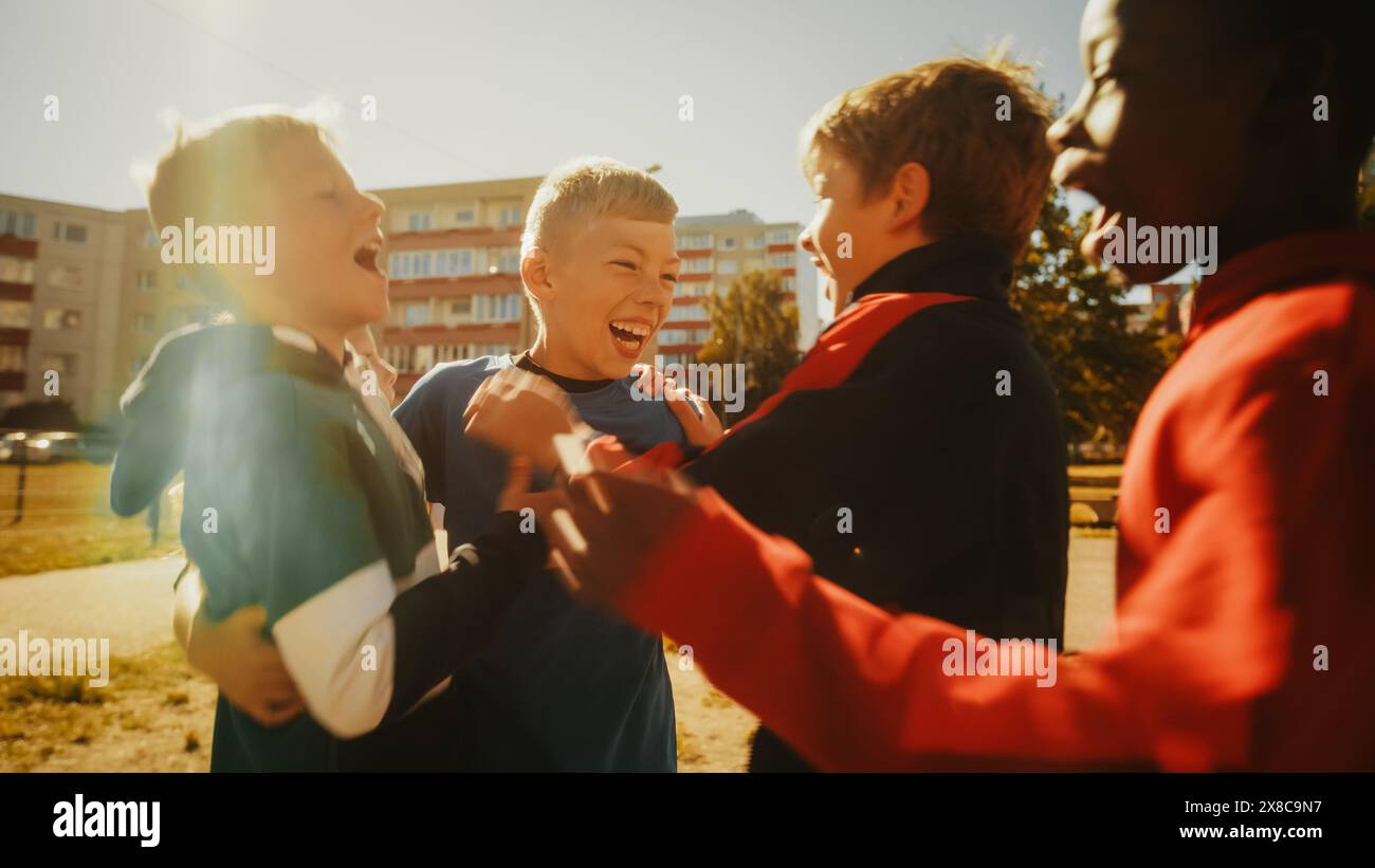 Multiethnic Diverse Friends Playing Soccer Outside in Urban Backyard ...