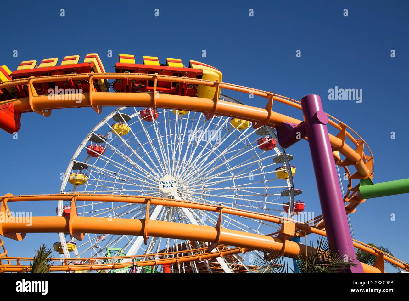 Roller Coaster and Ferris Wheel, Pacific Park, Santa Monica, California ...