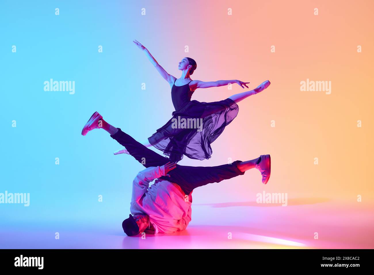 Visual Dance Symphony. Grace of ballet and agility of breakdancing, man ...