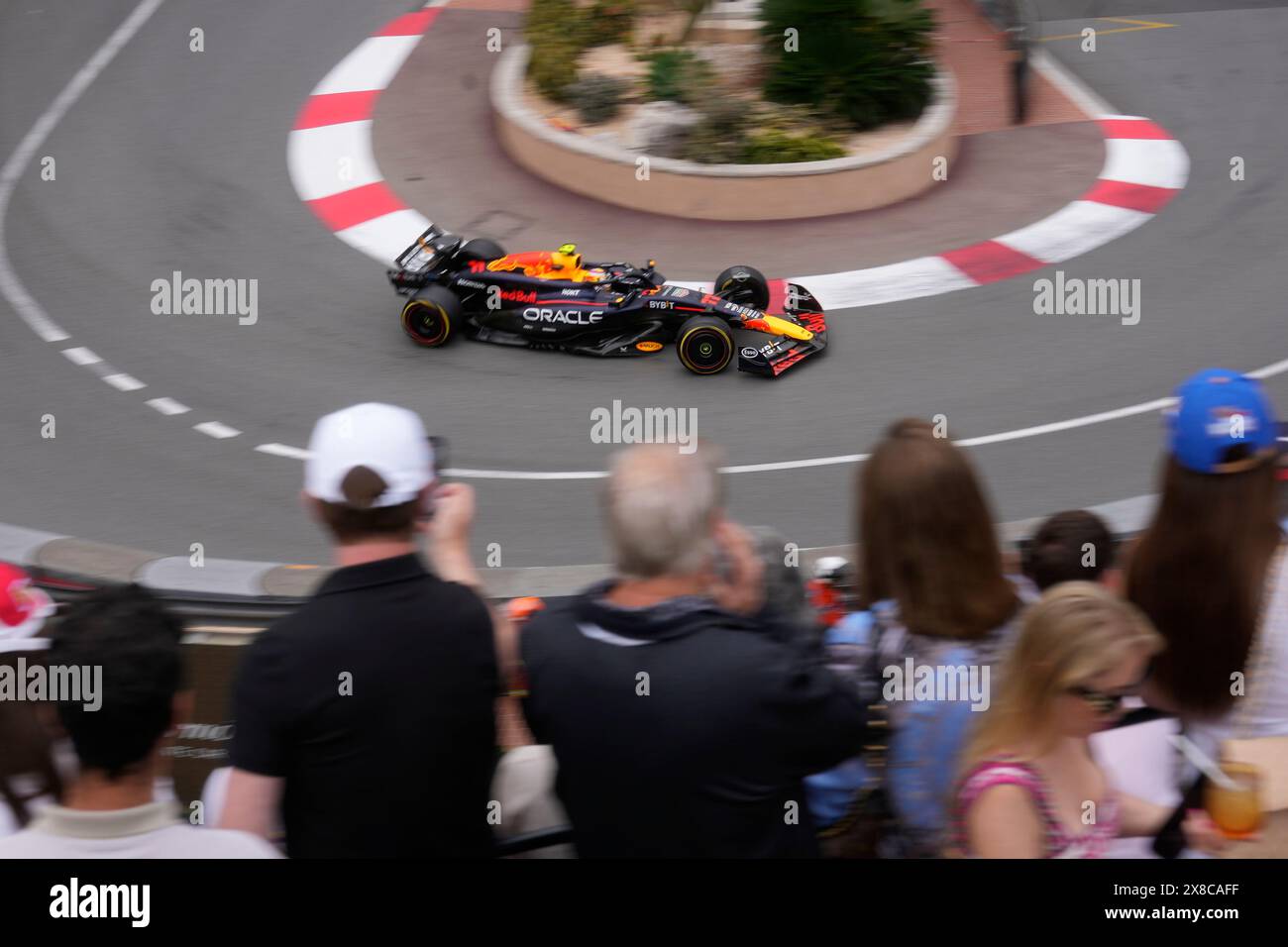 Red Bull driver Sergio Perez of Mexico steers his car during the second free practice ahead of ...