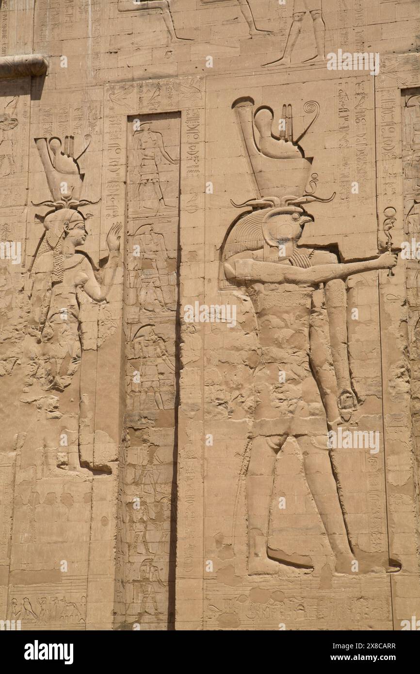 Relief Depicting Horus (right), Pylon, Temple of Horus, Edfu, Egypt ...