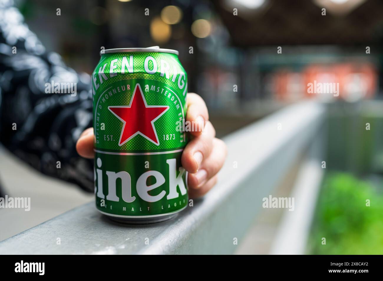 Heineken can hand hi-res stock photography and images - Alamy