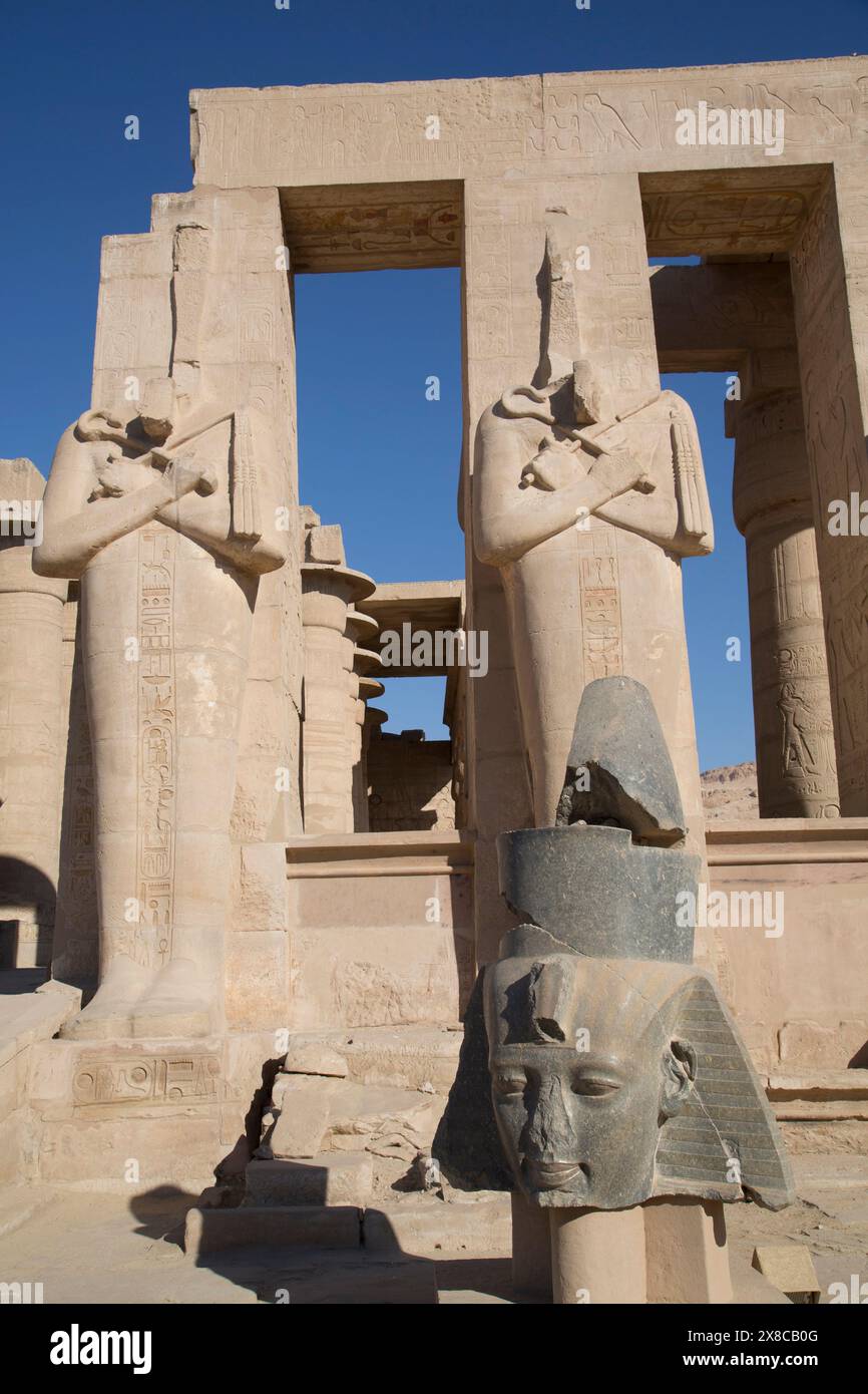 Bust of Ramses II (foreground), Statues of Osiris (background), The ...