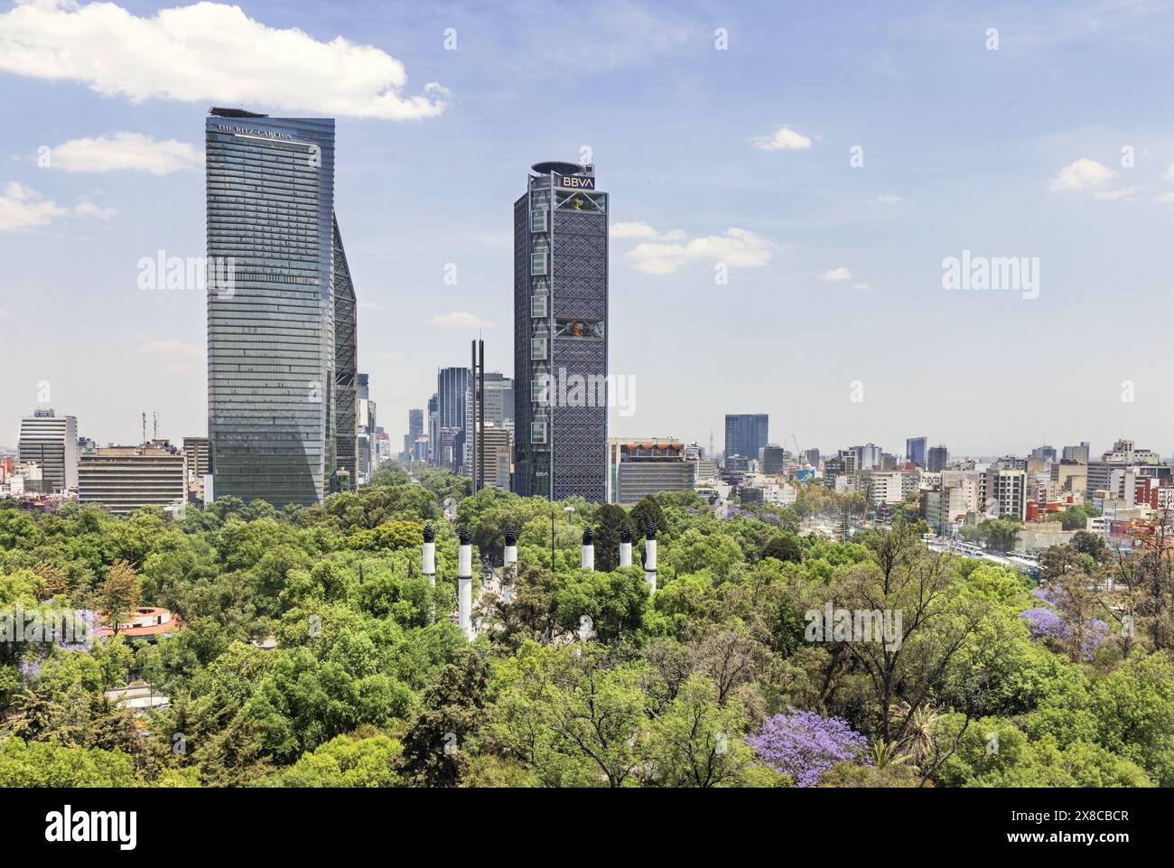 Mexico City skyline; view Chapultepec Park and the Paseo de la Reforma ...
