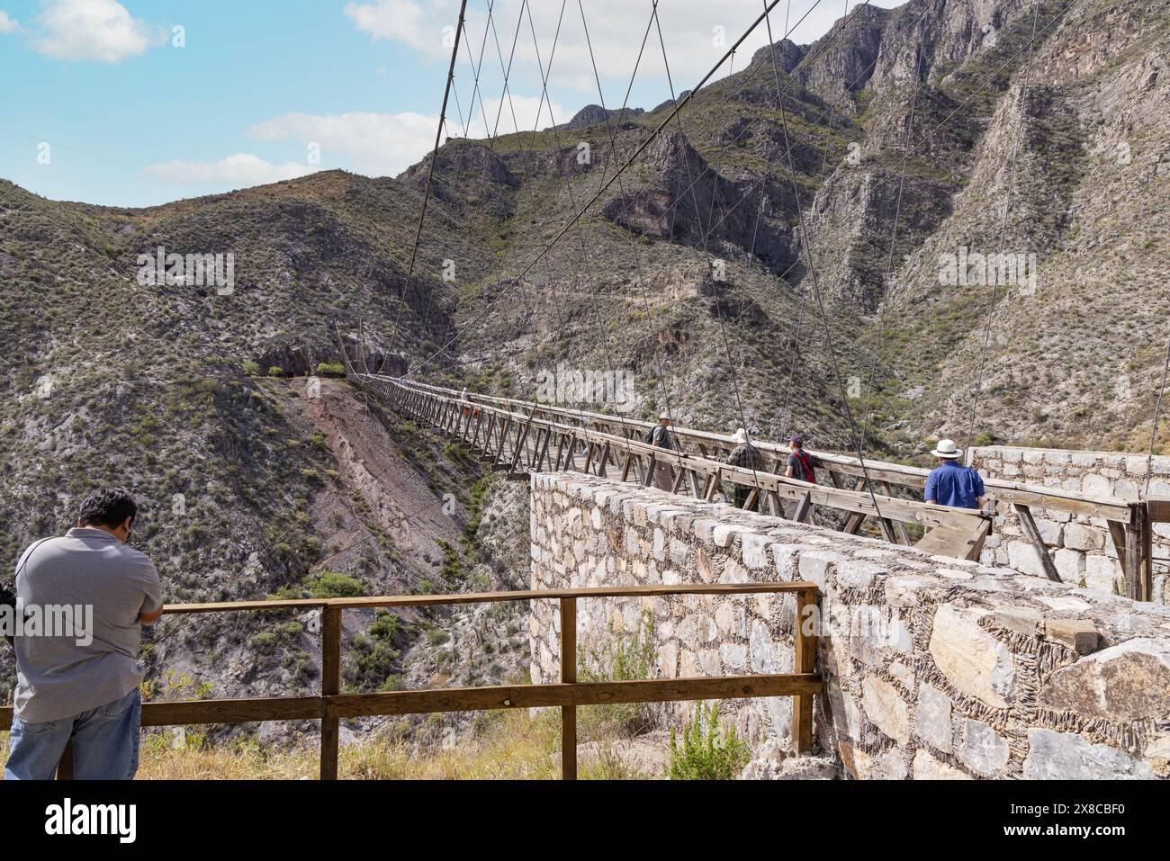 Mexico travel; people crossing Ojuela Bridge, or Mapimi Bridge ...