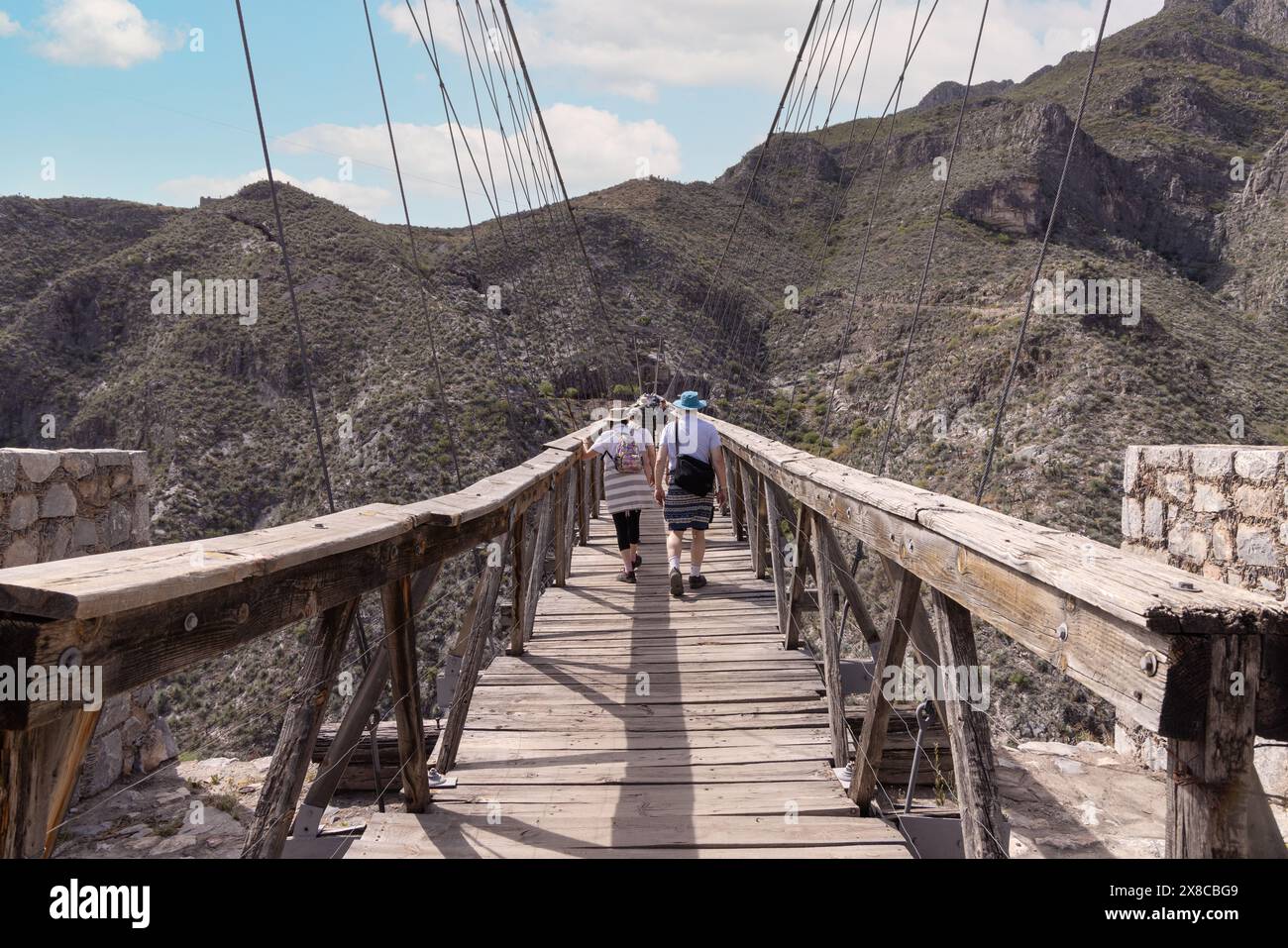 Mexico travel; people crossing Ojuela Bridge, or Mapimi Bridge ...