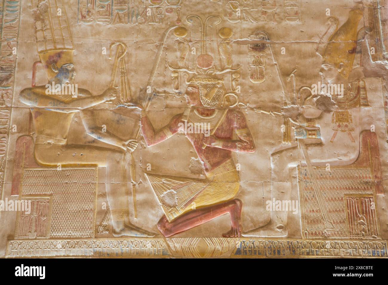 Bas-relief, Pharaoh Seti I (center), God Amun (left), Temple of Seti I ...