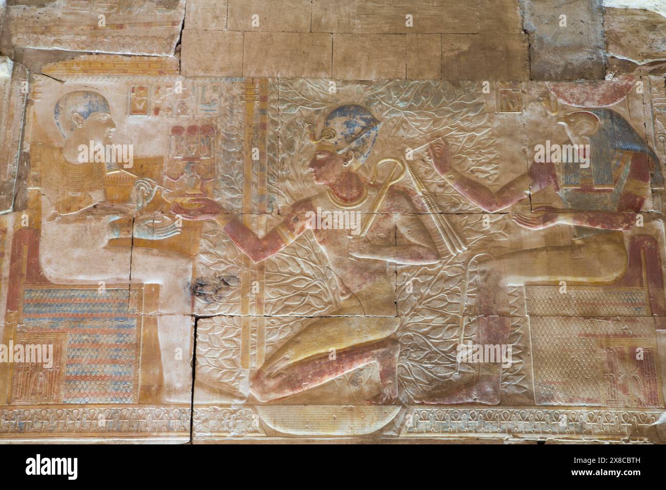 Bas-relief of Pharaoh Seti I (center), God Horus (right), Temple of ...