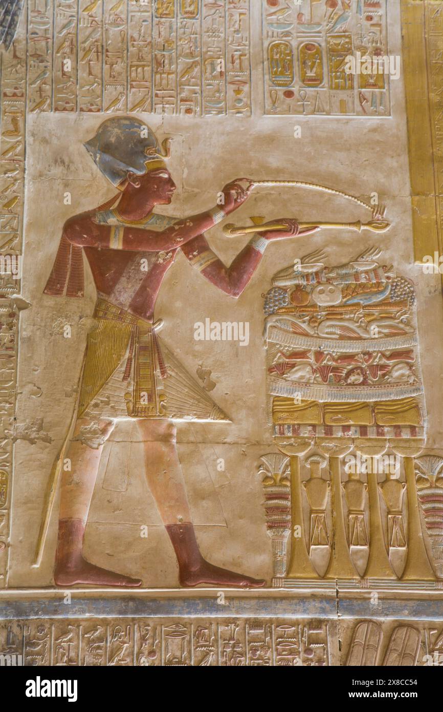 Bas-relief of Pharaoh Seti I (right), God Horus (left), Temple of Seti ...