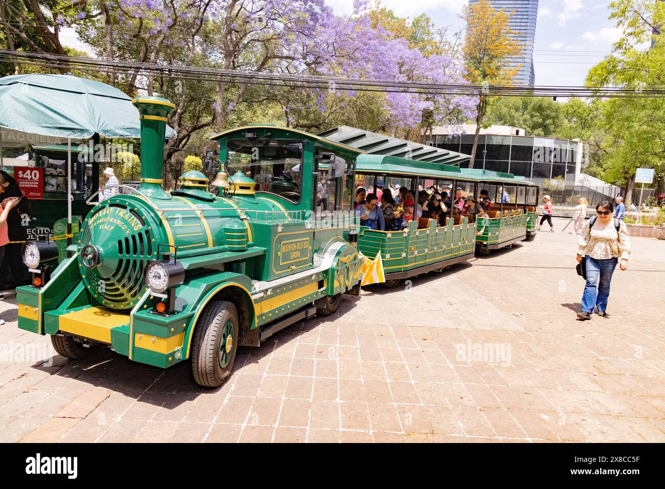 Mexico city tourists; A crowded tourist train on the street, Mexico ...
