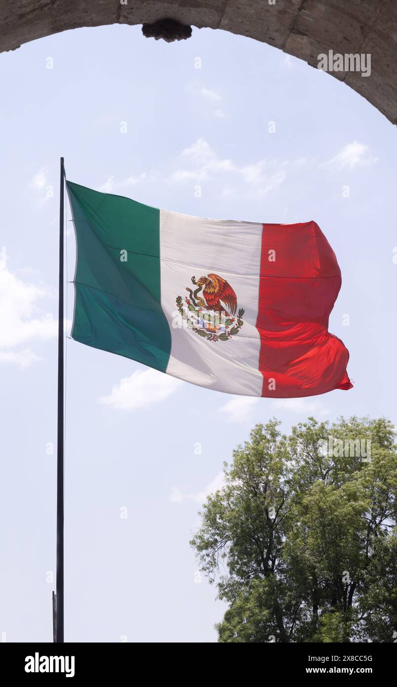 National Mexican flag; The Mexico flag flying from a flagpole mast ...