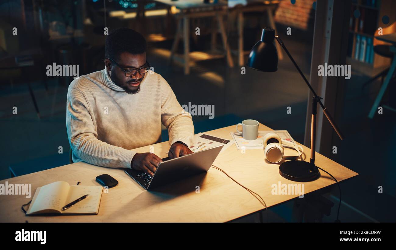 Portrait focused software developer writing hi-res stock photography ...