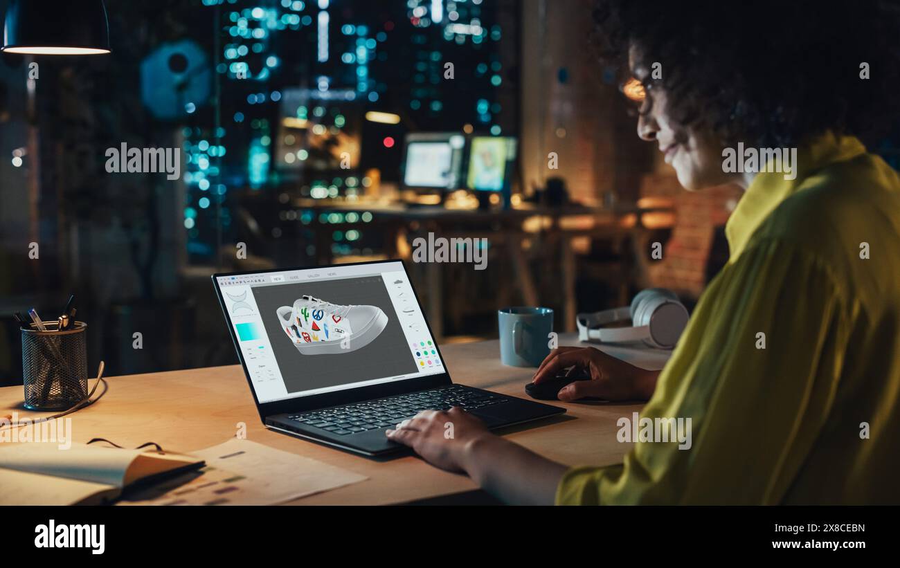 Creative Multiethnic Female Working on Laptop Computer with a Fashion ...