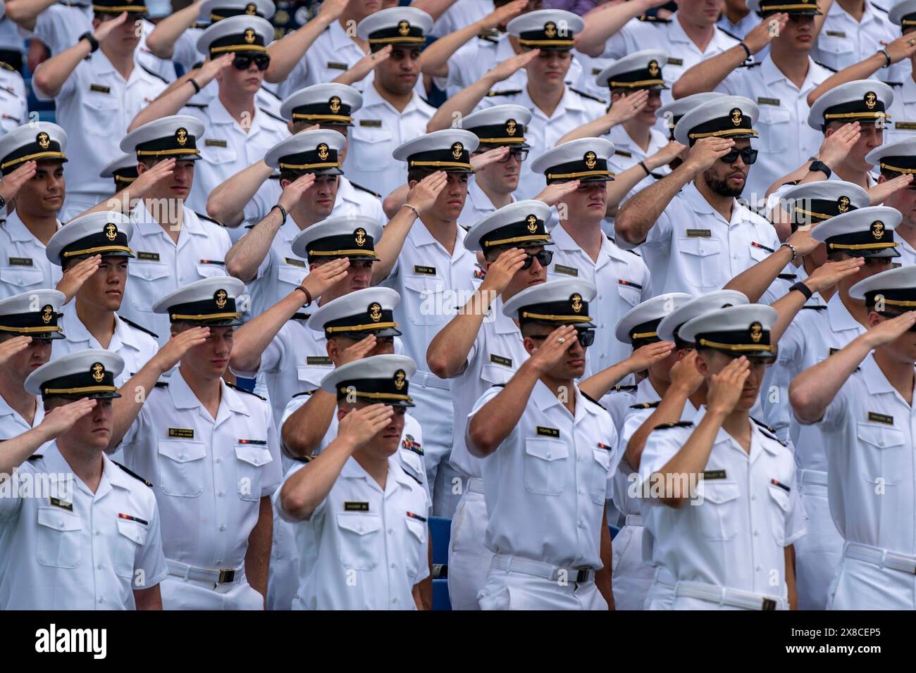 Annapolis, United States. 24th May, 2024. Midshipmen salute during the ...