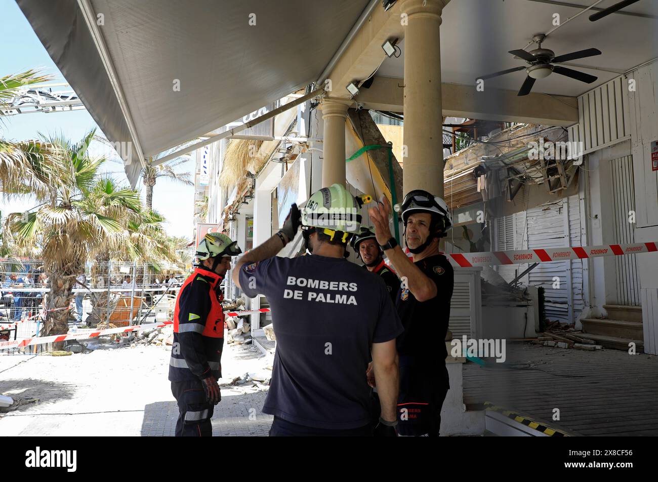 24 May 2024, Spain, Palma: Firefighters work on the Medusa Beach Club ...
