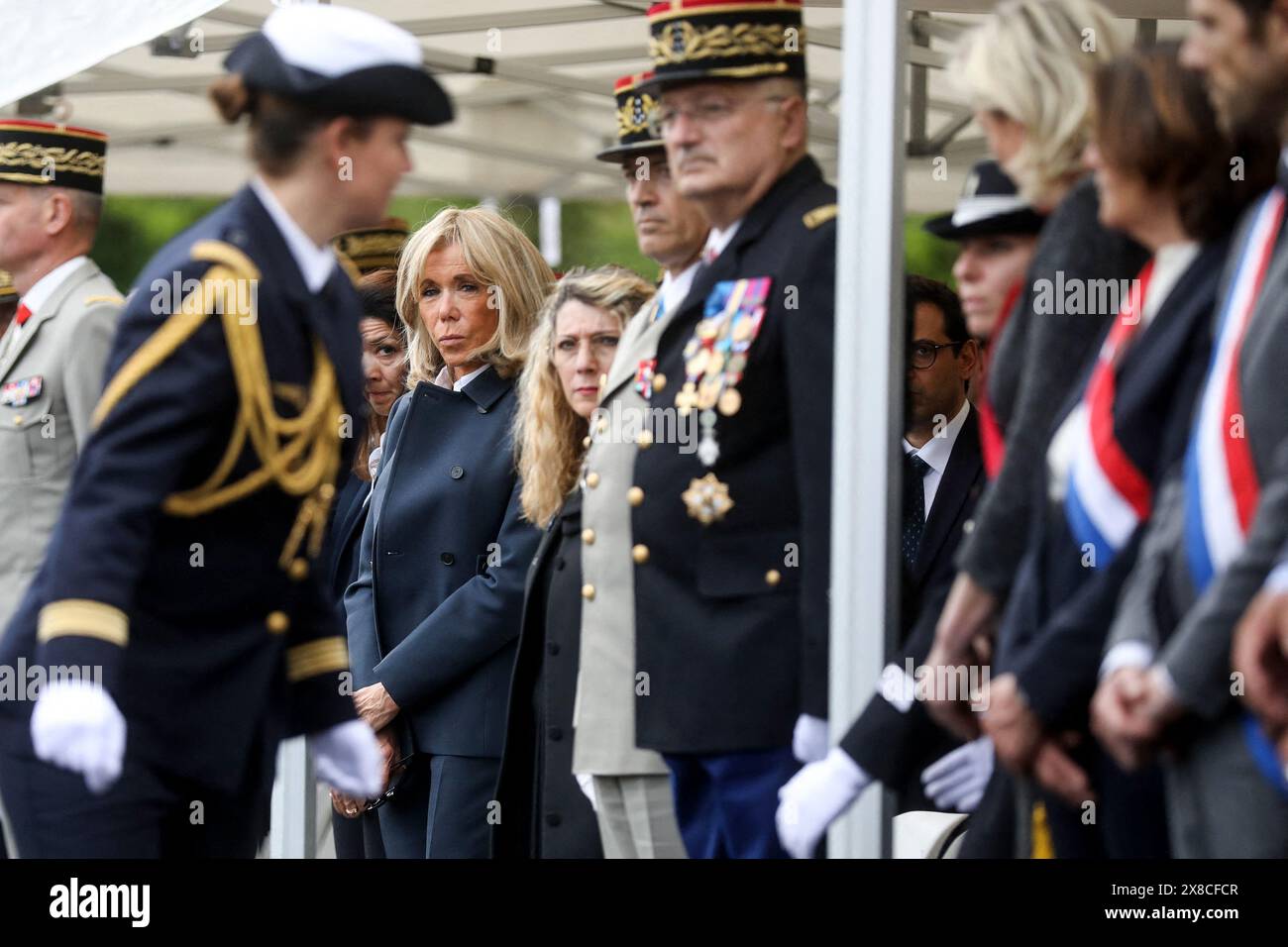 Brigitte Macron during a military funeral ceremony at the Fort de ...