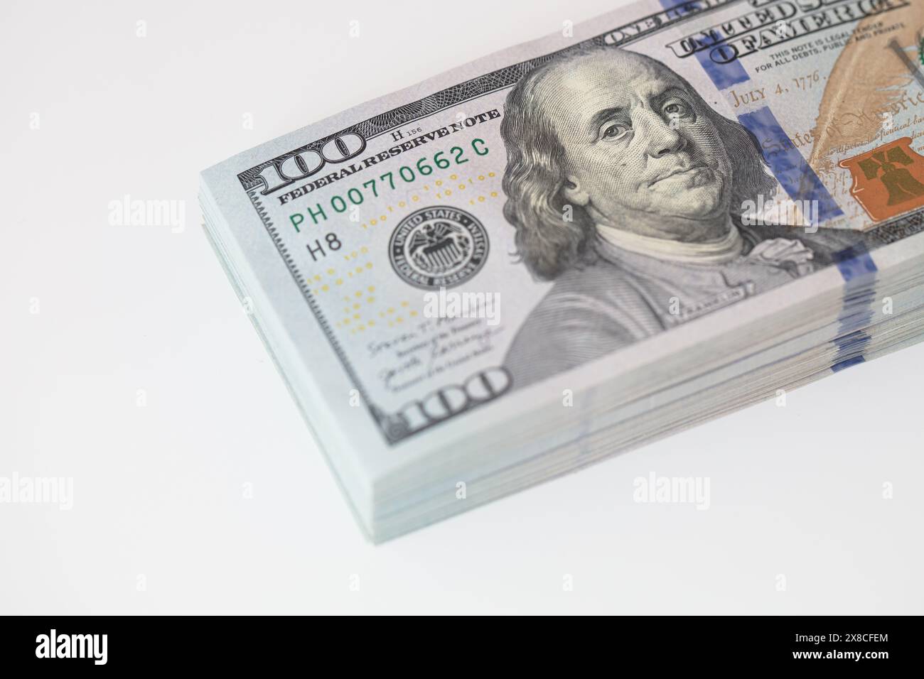 Pile of US 100 dollar banknotes for design purpose Stock Photo - Alamy