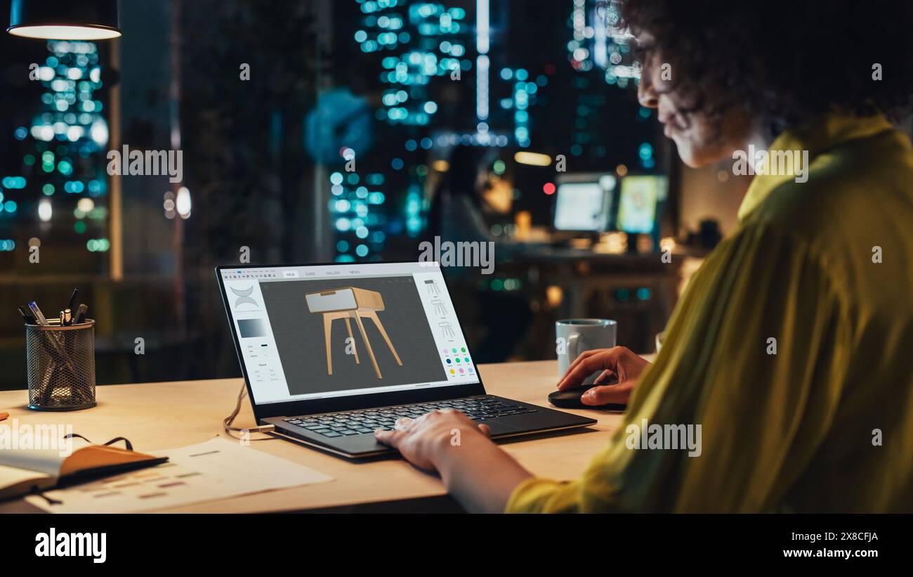 Creative Multiethnic Female Working on Laptop Computer with an Interior ...