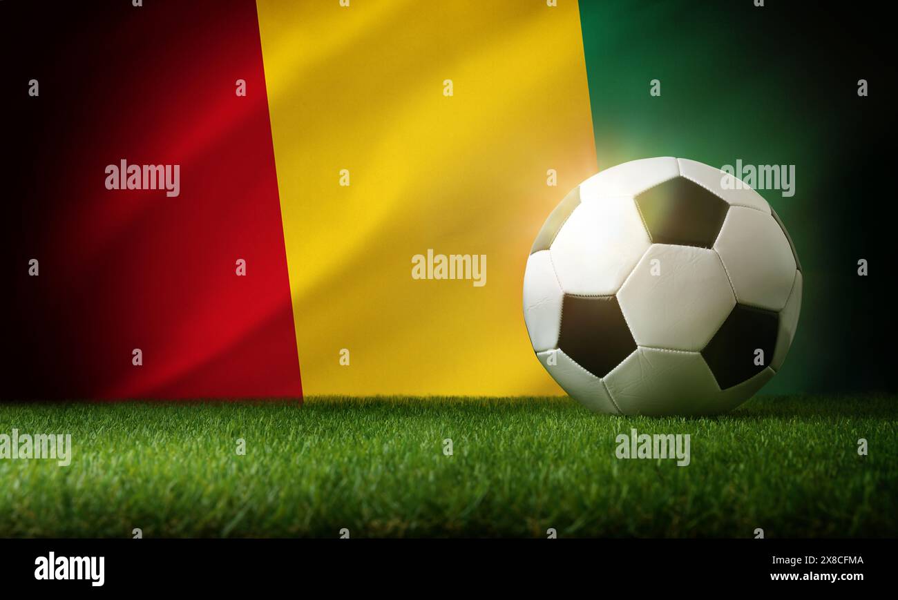 Guinea national team composition with classic ball on grass and flag in ...