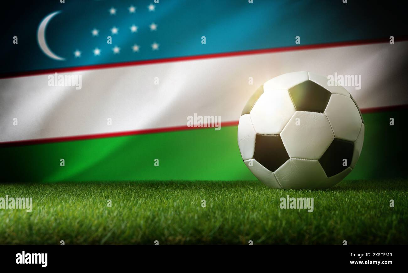 Uzbekistan national team composition with classic ball on grass and ...