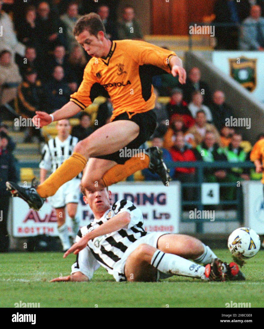 LIVINGSTON V ST MIRREN, 27/11/99. Livingston's David Bingham is tackled ...