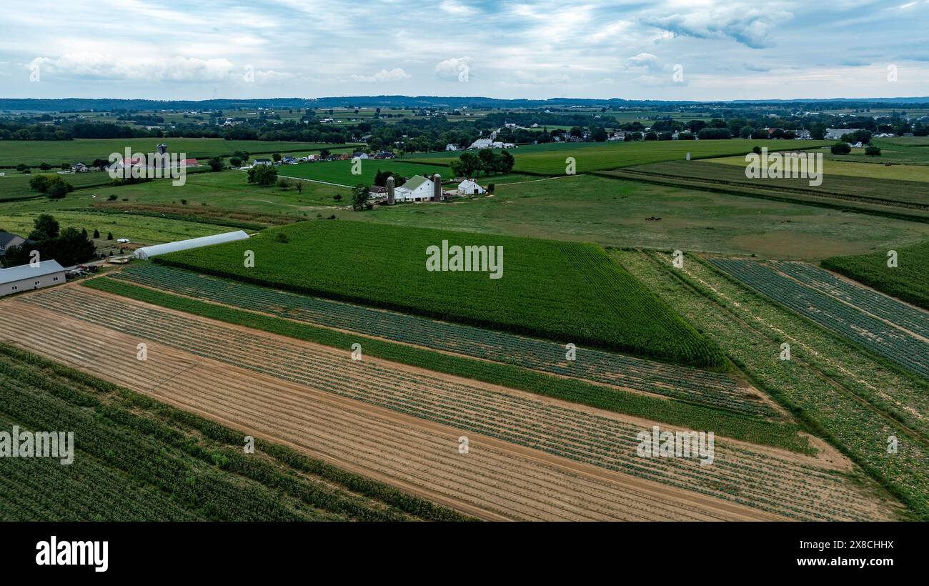 An Aerial View of Farmland with Barns and Silos in Rural Countryside ...