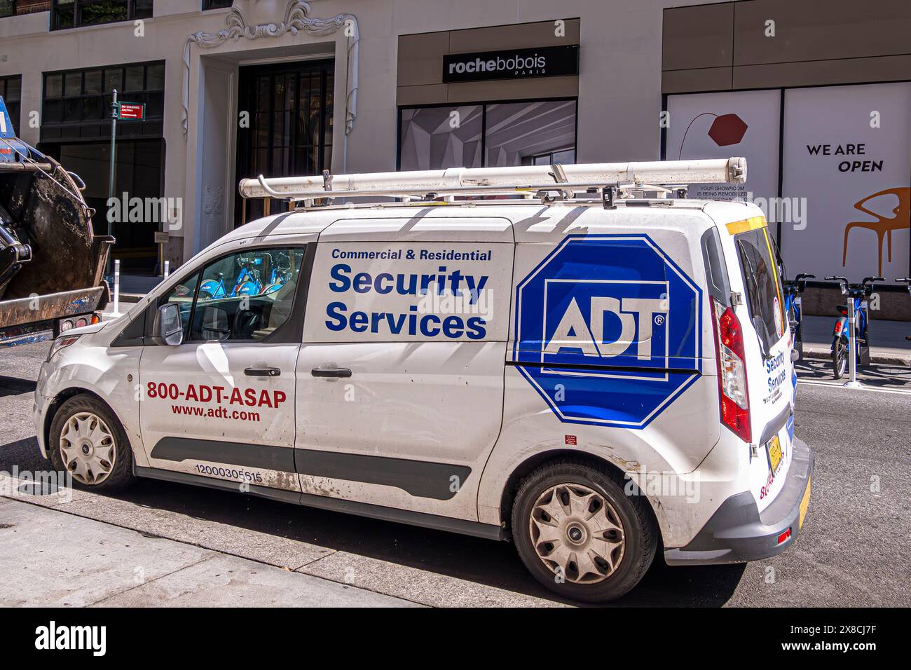 New York, NY, USA - August 2, 2023: ADT Security Service van on Madison ...