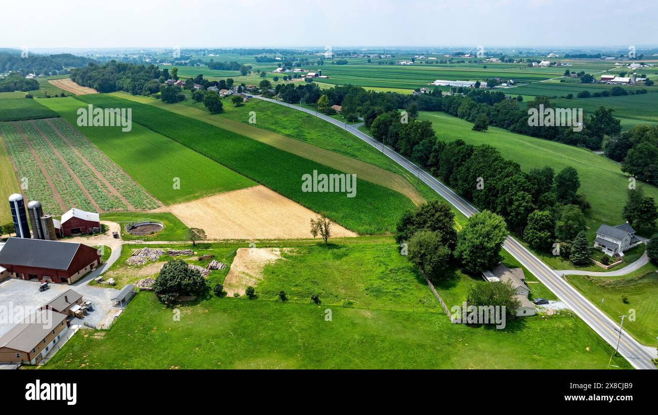 An Aerial View of Farmlands and Country Road in Rural Area Stock Photo ...