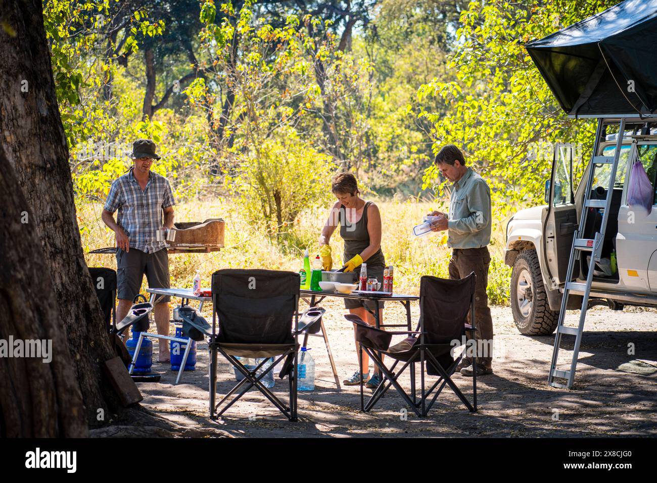 Setting up camp with a 4x4 jeep with pop-up tent, on a self drive ...