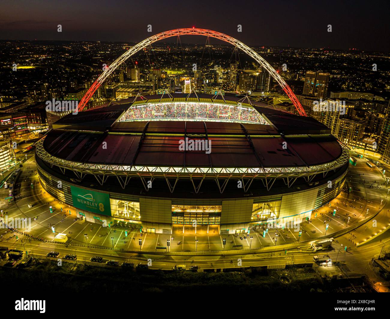 Wembley Stadium with arch lit up in Red and White to support the ...