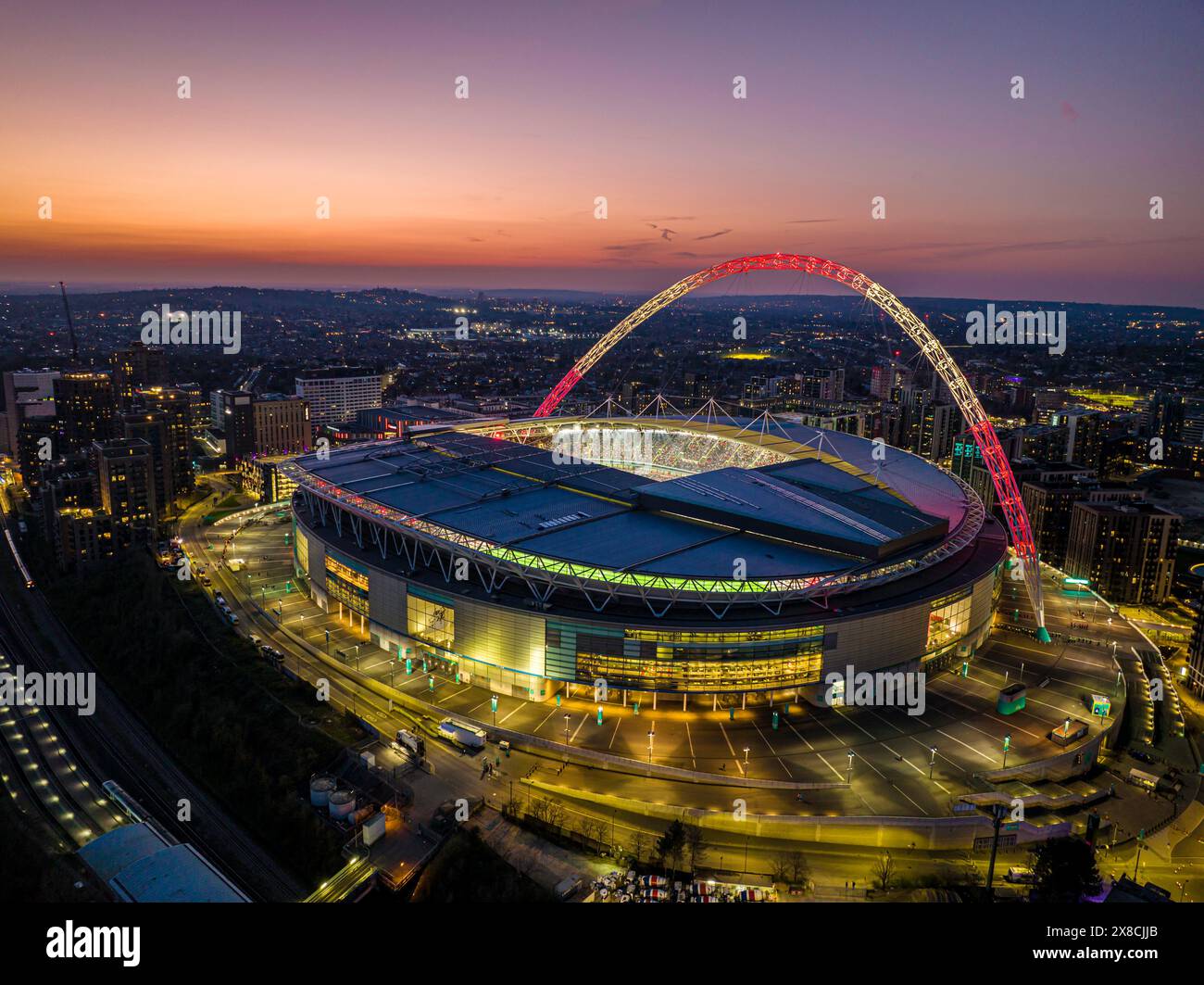 Wembley Stadium with arch lit up in Red and White to support the ...