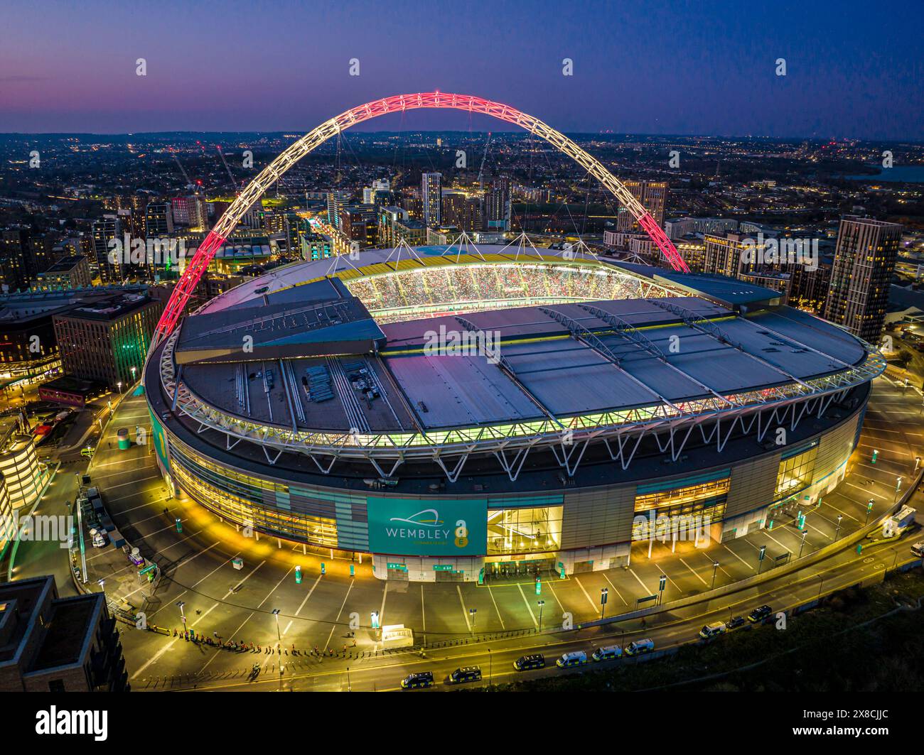 Wembley Stadium with arch lit up in Red and White to support the ...