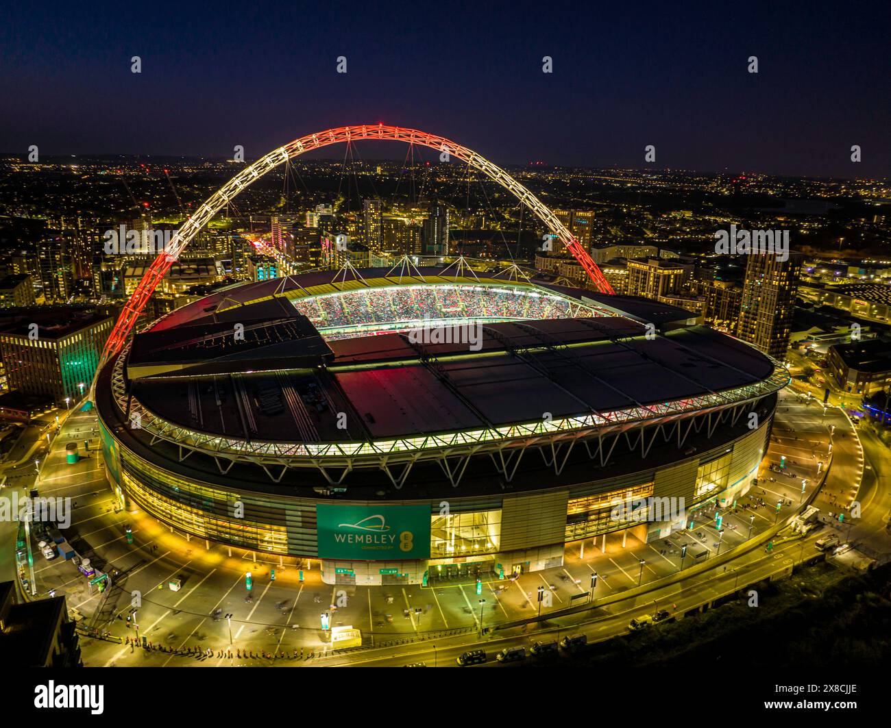 Wembley Stadium with arch lit up in Red and White to support the ...