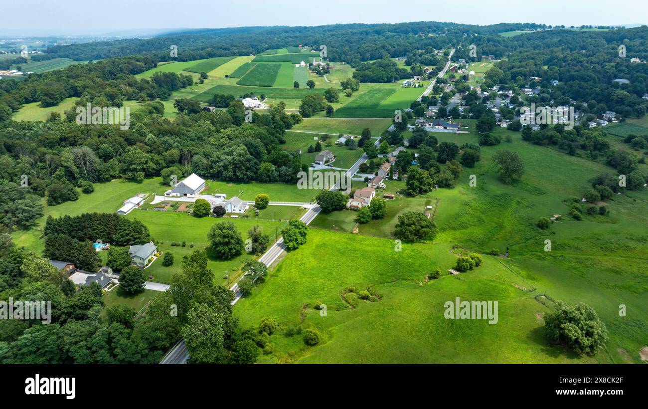 An Aerial View of Rural Homesteads and Lush Farmlands Stock Photo - Alamy