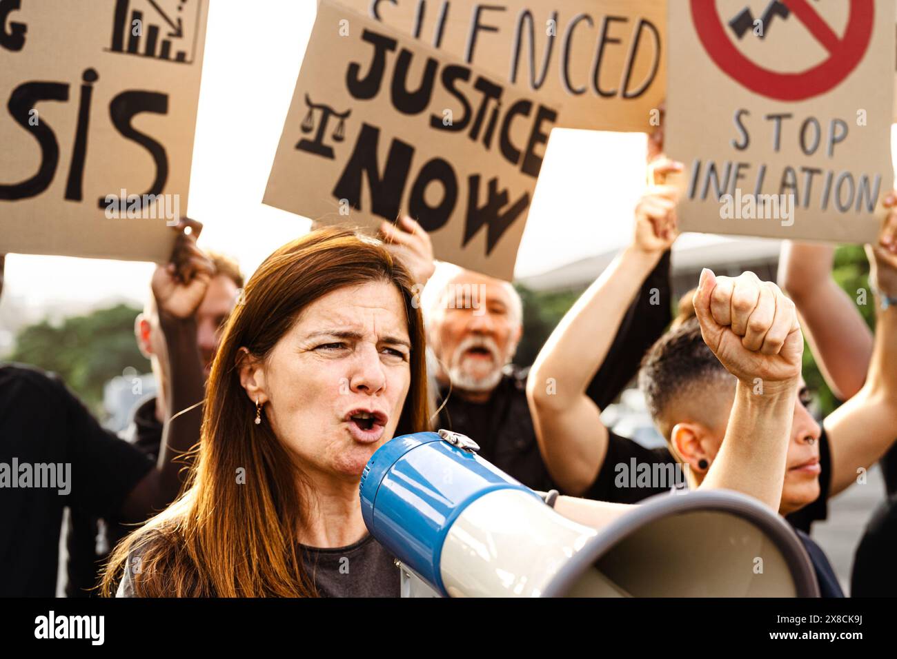 Multiracial people protesting against financial crisis and global ...