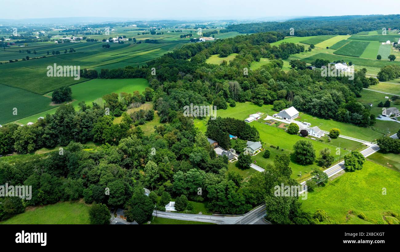 An Aerial View of Rural Homesteads and Lush Farmlands Stock Photo - Alamy