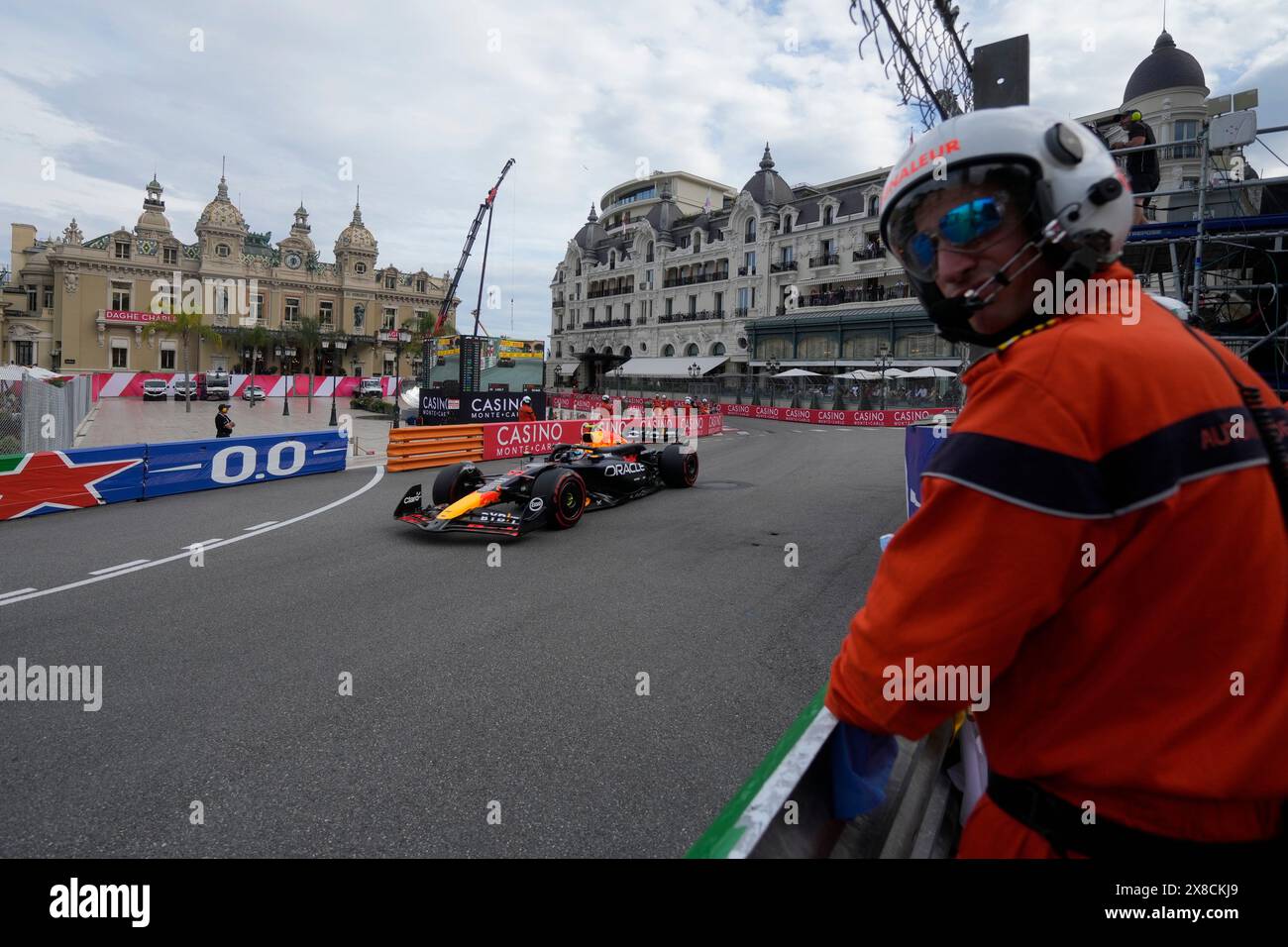 Red Bull driver Sergio Perez of Mexico steers his car during the second free practice ahead of ...