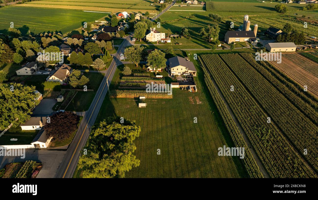 An Aerial View of Rural Community with Homes, Gardens, and Farmland ...